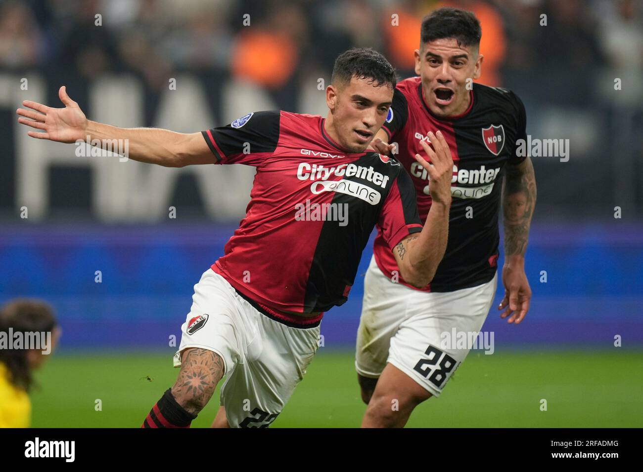 Marcos Portillo of Argentina's Newell's Old Boys, left, celebrates ...