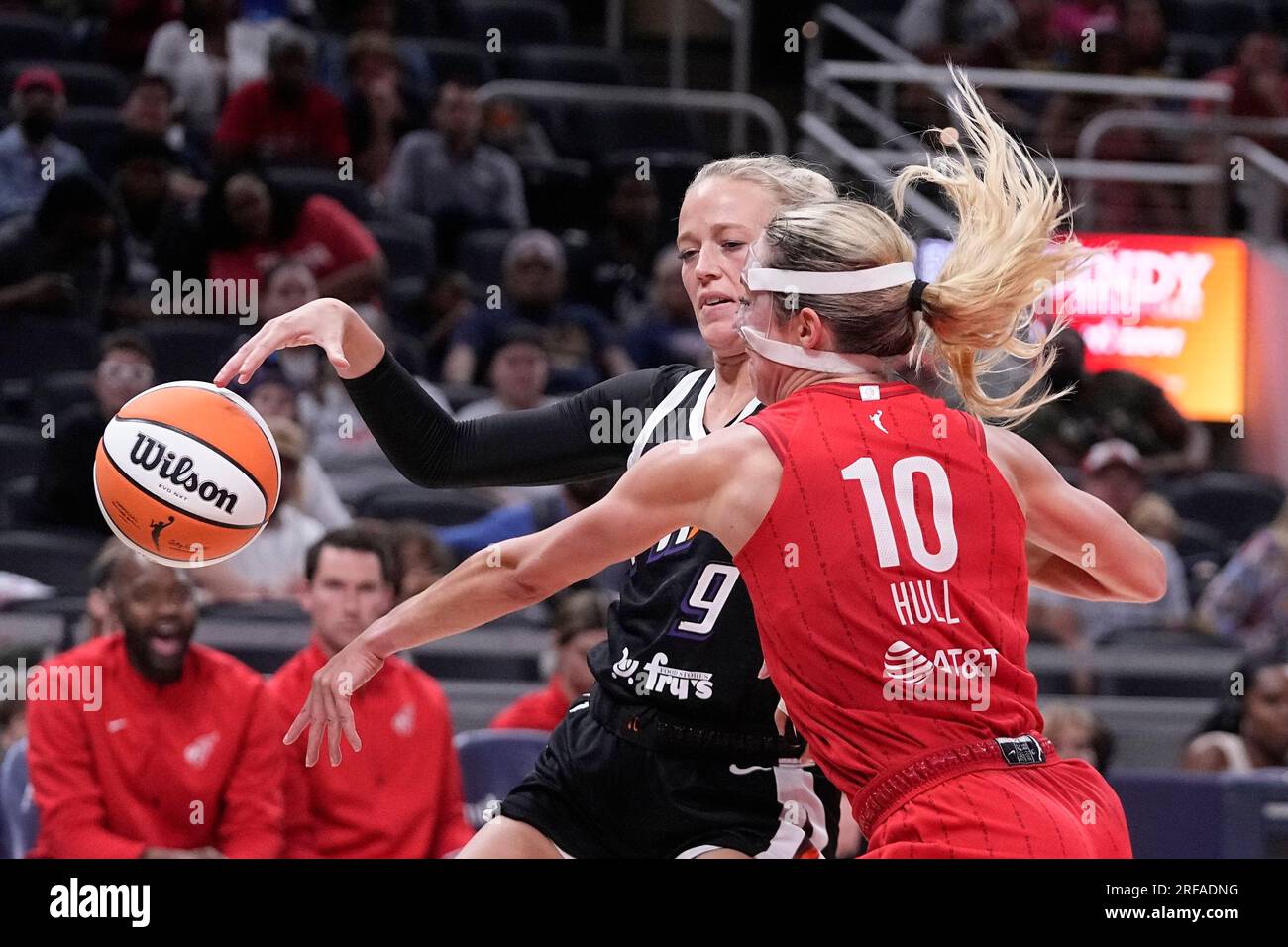 Phoenix Mercury's Sophie Cunningham (9) is defended by Indiana Fever's ...