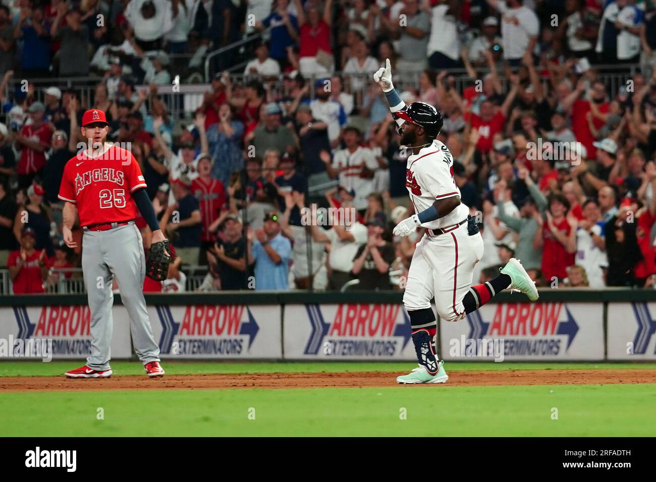 Atlanta Braves' Michael Harris II (23) gestures as he runs past Los ...