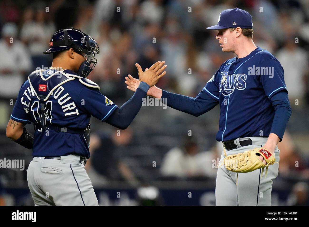 Tampa Bay Rays relief pitcher Pete Fairbanks, right, celebrates with ...