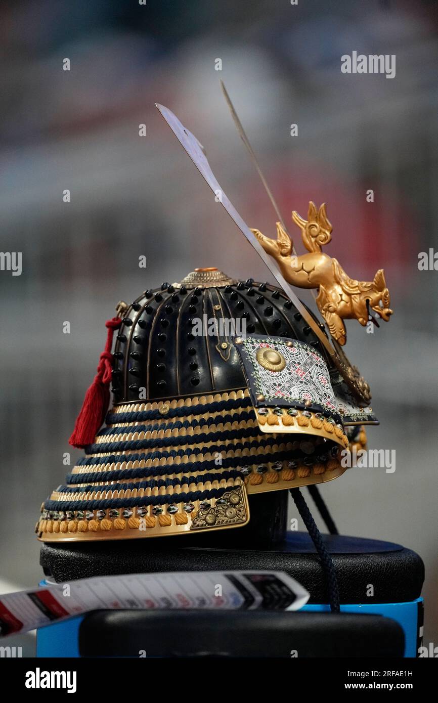 A samurai warrior's helmet is shown in the Los Angeles Angels dugout ...