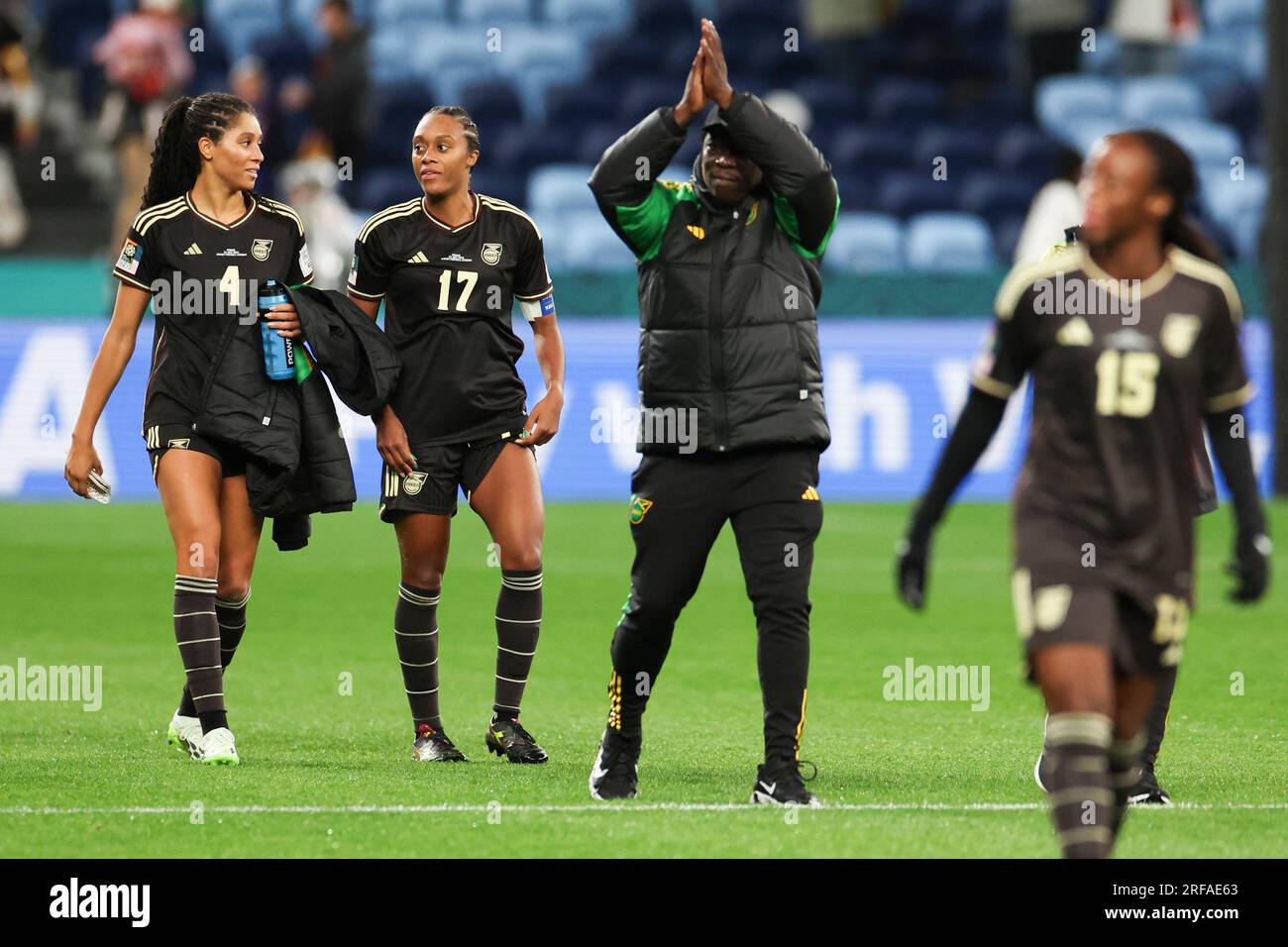 Jamaica's Chantelle Swaby, left, and her sister Allyson walk from the ...