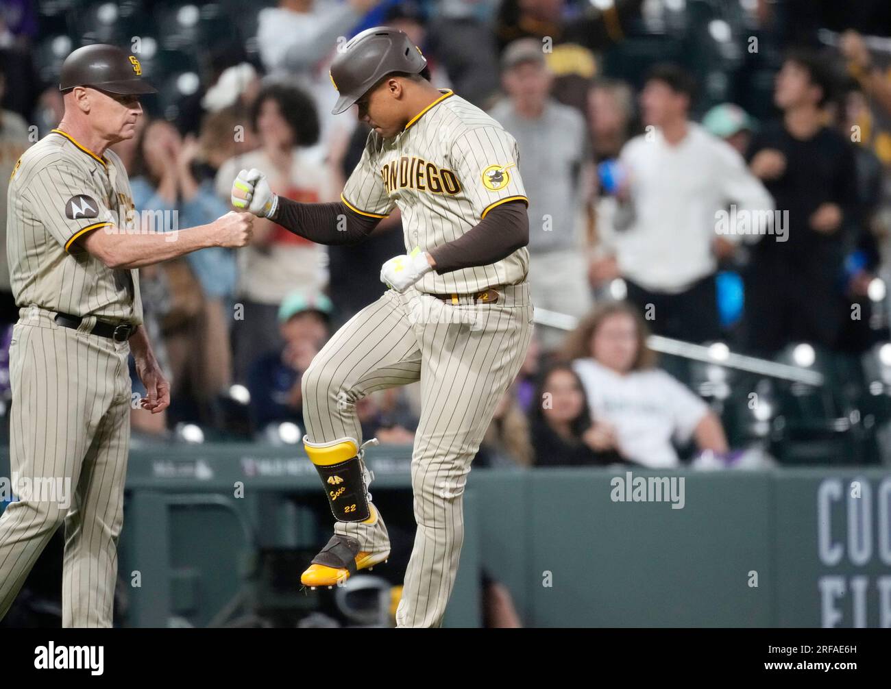San Diego Padres third base coach Matt Williams, left, congratulates ...