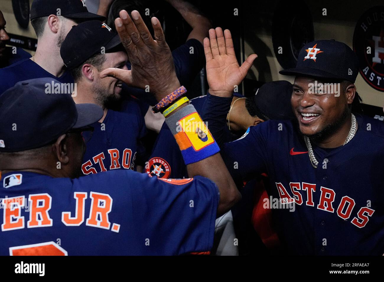 Houston Astros starting pitcher Framber Valdez is congratulated in the dugout after throwing a ...