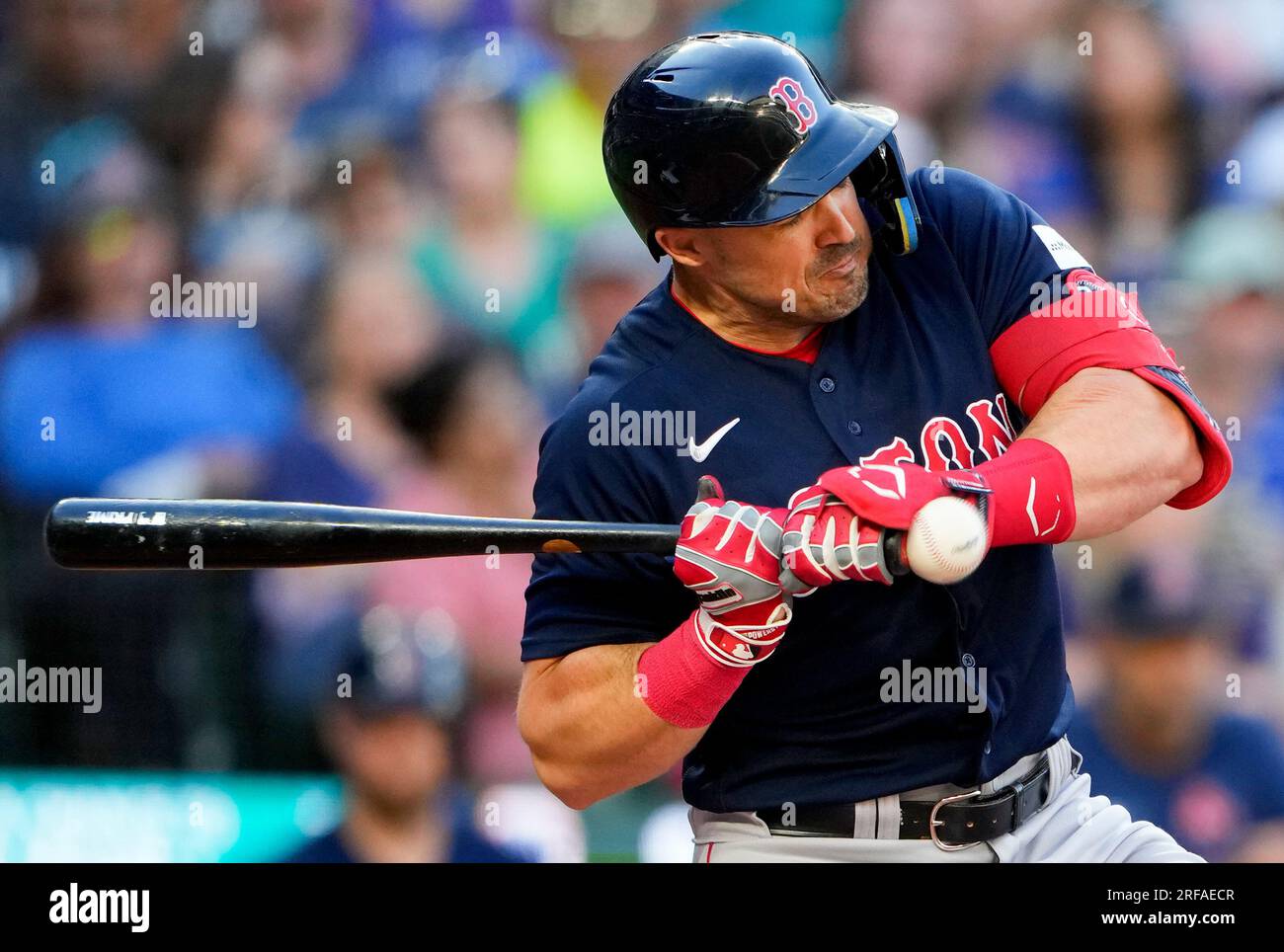 Boston Red Sox's Adam Duvall is hit by a pitch from Seattle Mariners ...