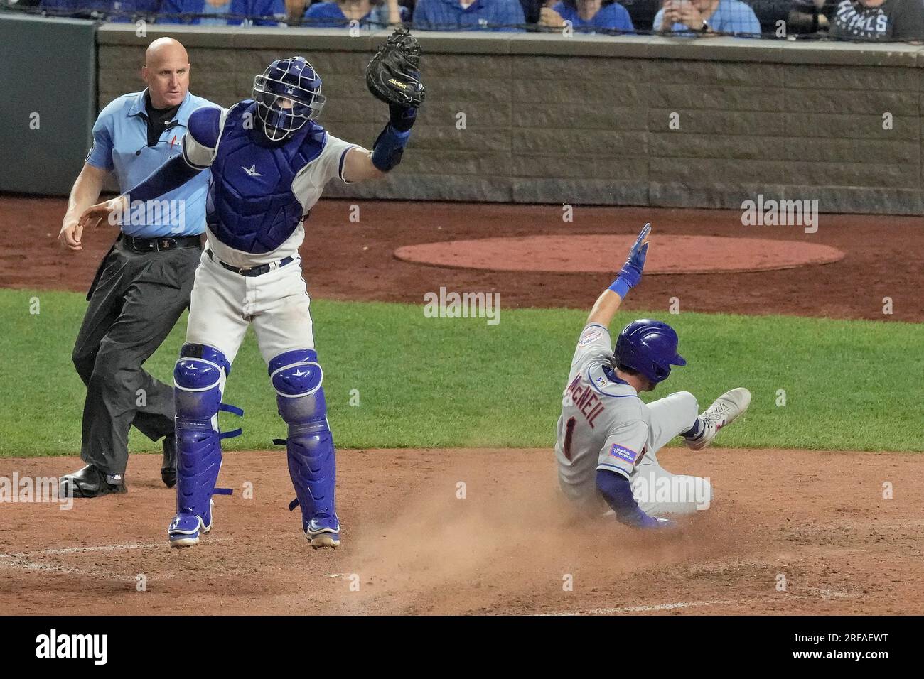 New York Mets' Jeff McNeil (1) beats the tag by Kansas City Royals catcher Freddy Fermin to ...