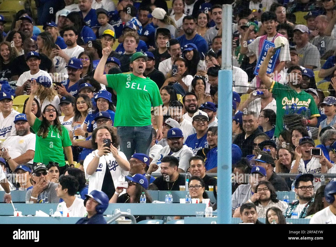 Several fans in the crowd chant "Sell the team!" during the fifth ...