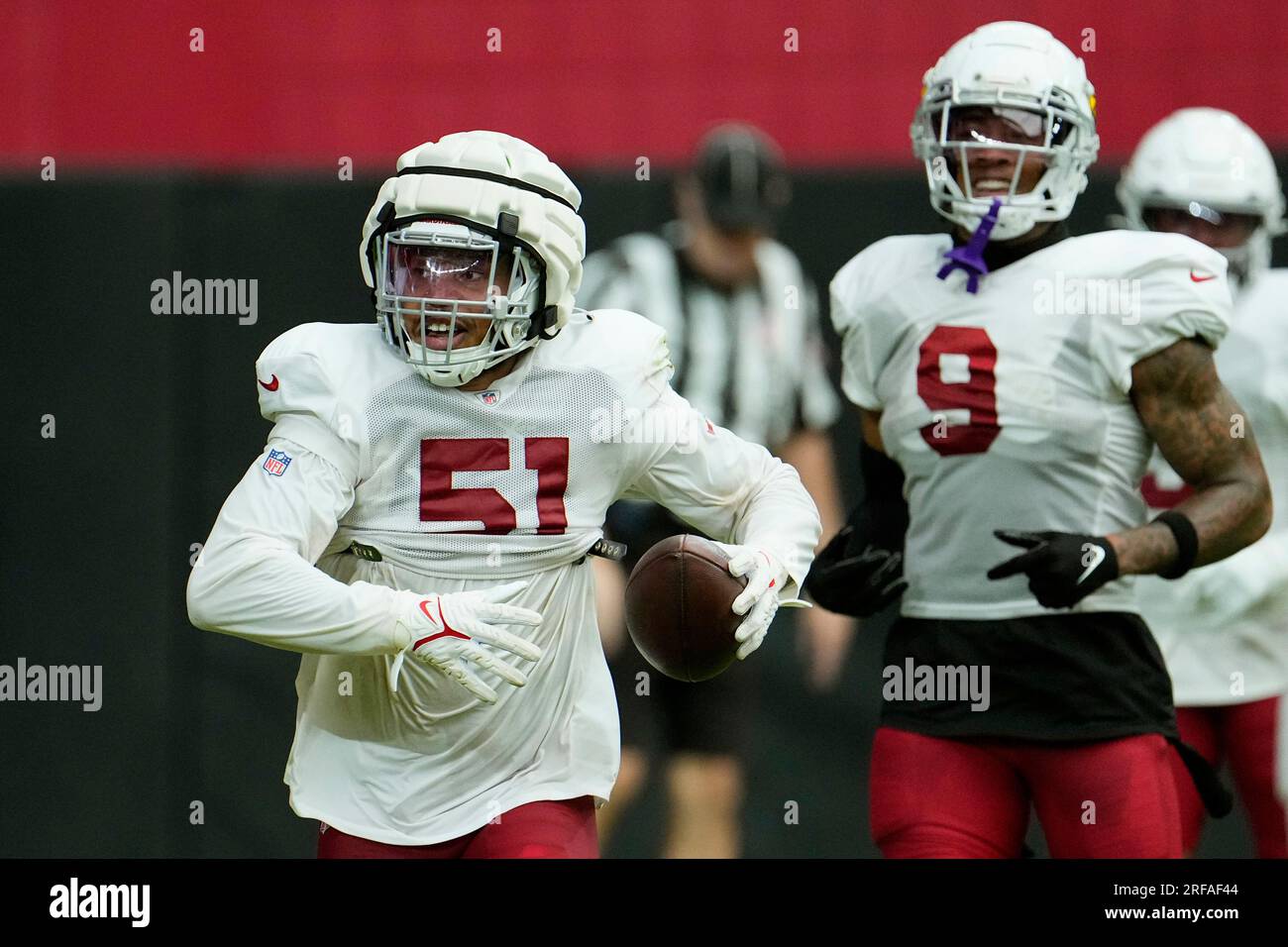 Arizona Cardinals linebacker Josh Woods, left, celebrates his ...