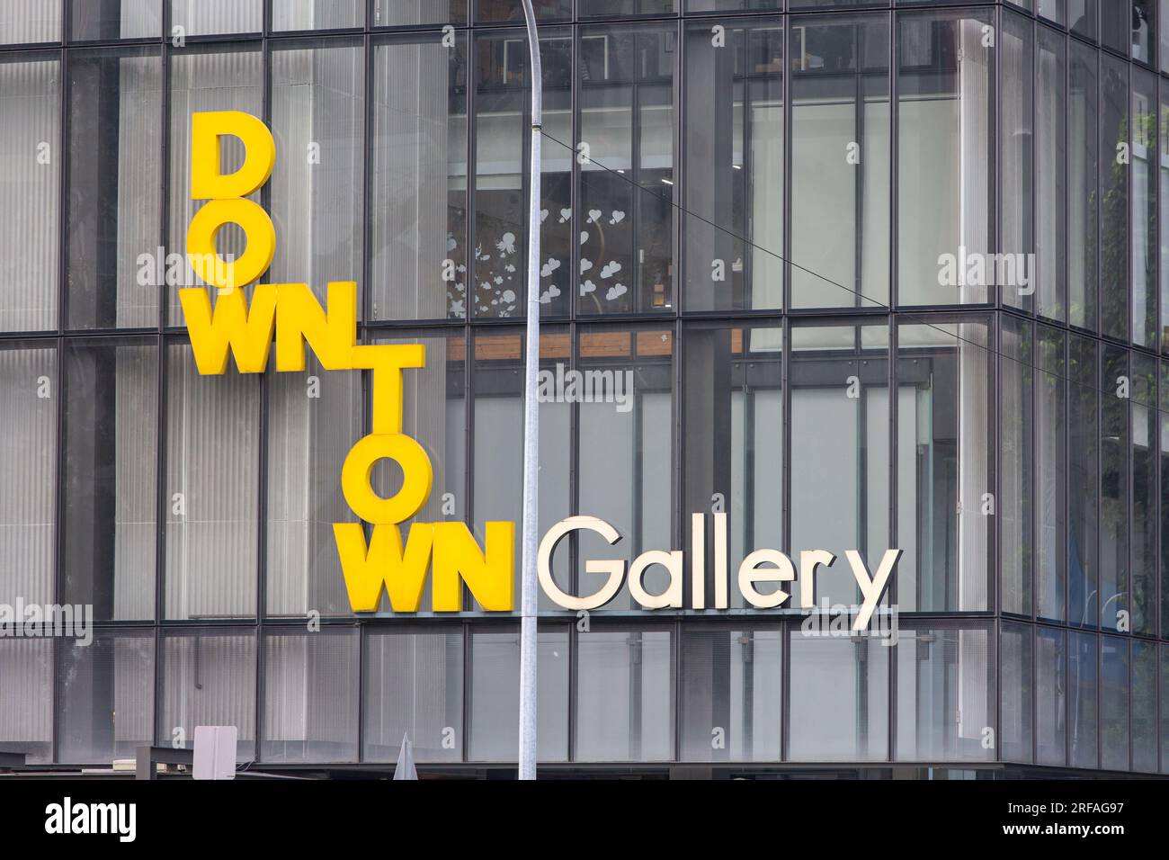 Downtown gallery signage in Singapore central business district area. A ...