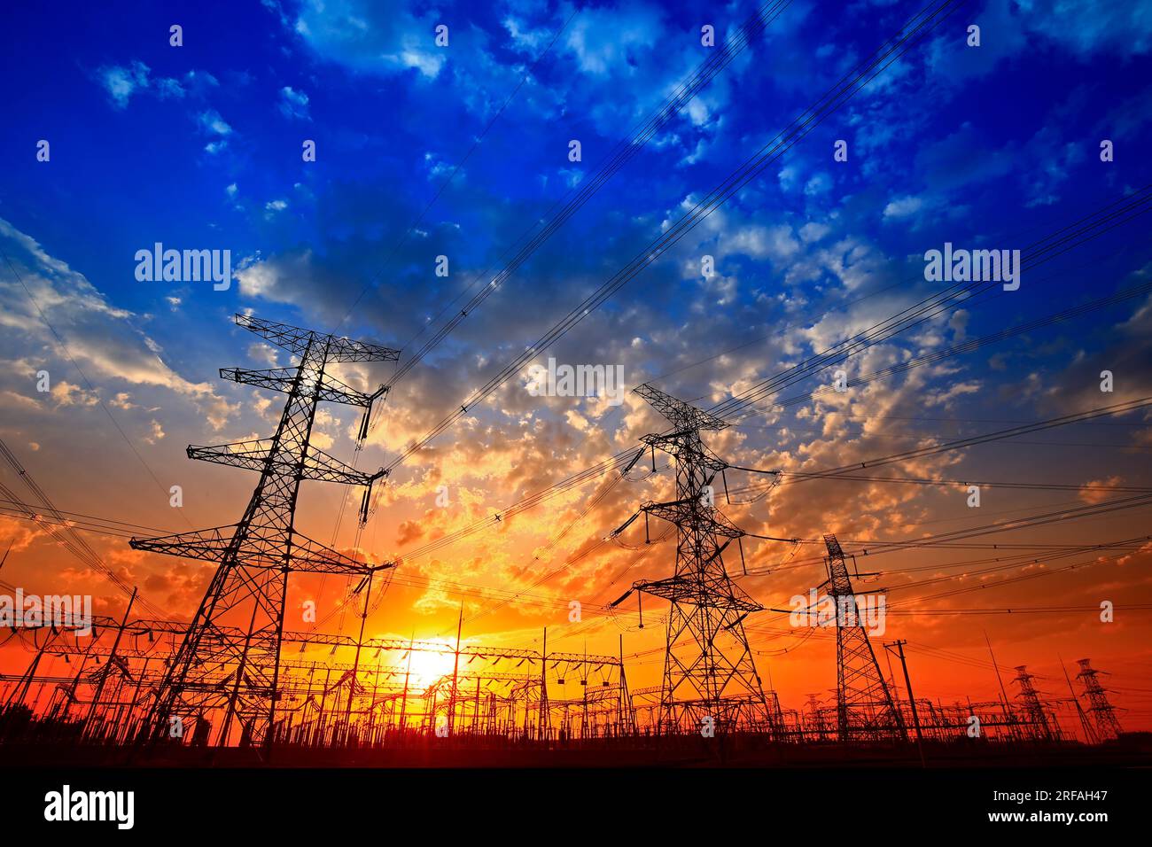 Electric tower, silhouette at sunset Stock Photo - Alamy