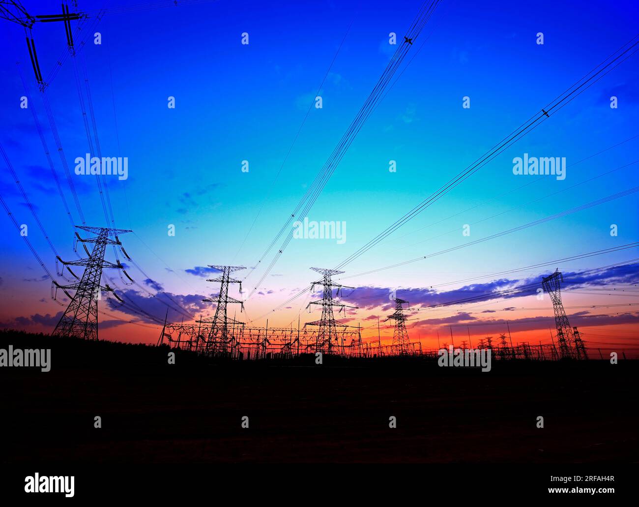 Electric tower, silhouette at sunset Stock Photo - Alamy