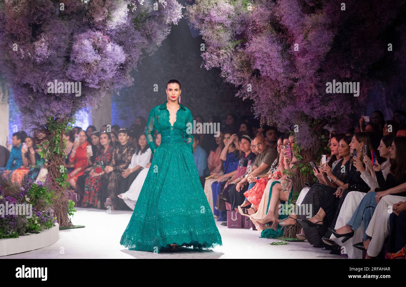 New Delhi, India. 1st Aug, 2023. A model displays a creation by Indian ...