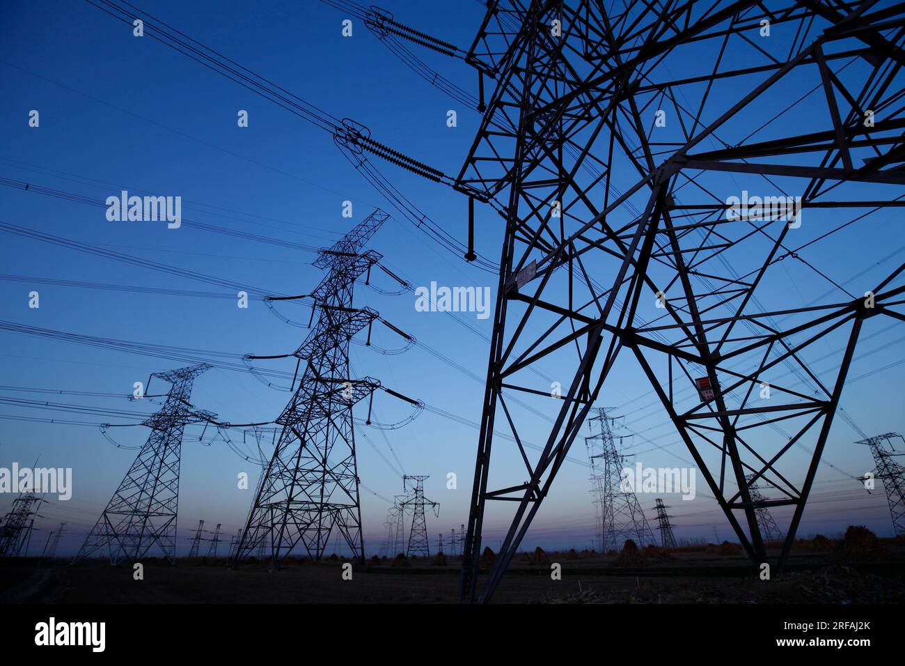 High voltage electric tower line Stock Photo - Alamy