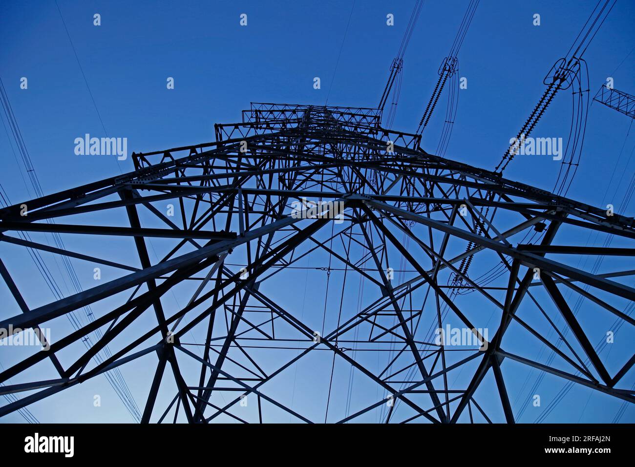 High voltage electric tower line Stock Photo - Alamy