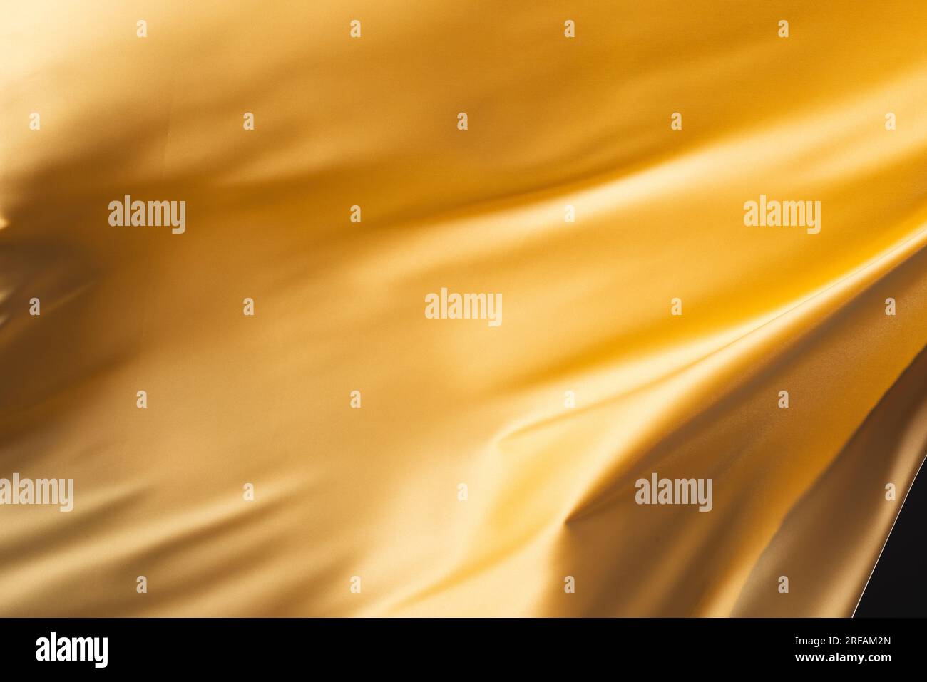 Gold silk fabric hi-res stock photography and images - Alamy