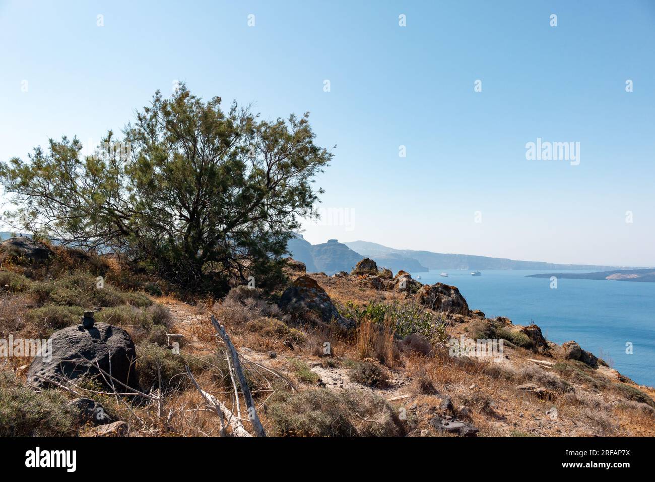 Santorini coastal landscape with caldera in background Stock Photo - Alamy