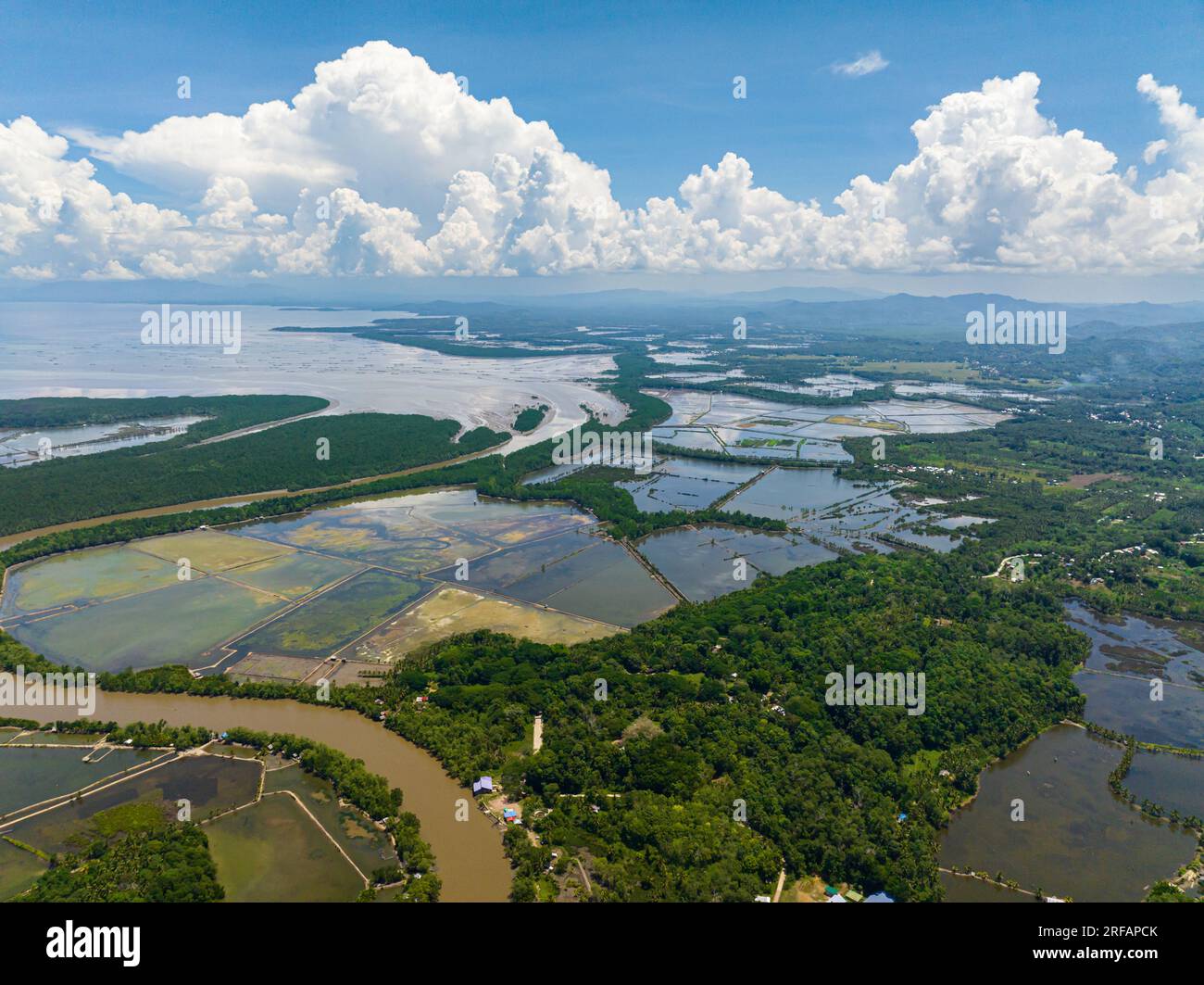 Fish farm in coastline in Mindanao. Blue sky and clouds. Philippines ...