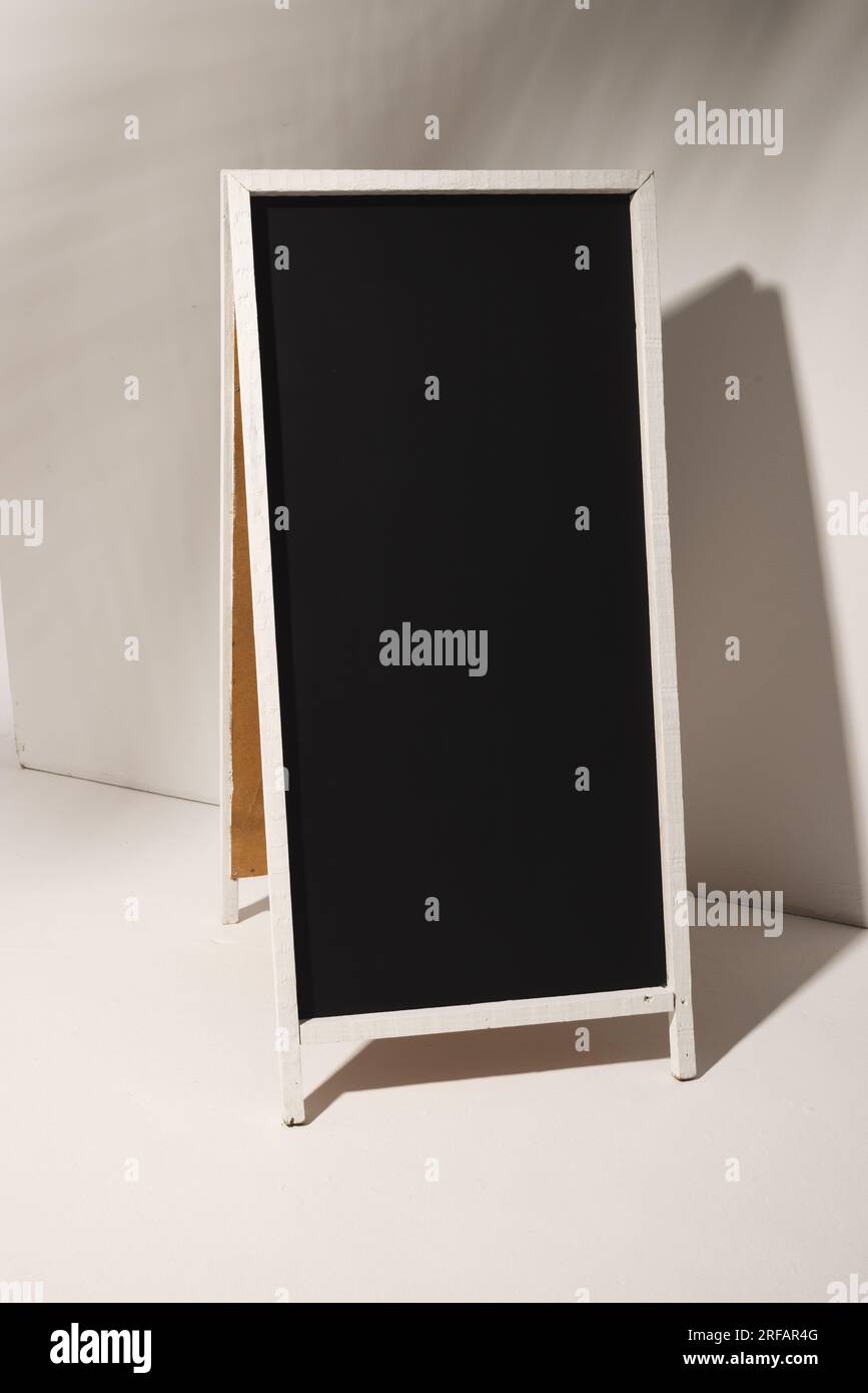 Black sign white writing hi-res stock photography and images - Alamy