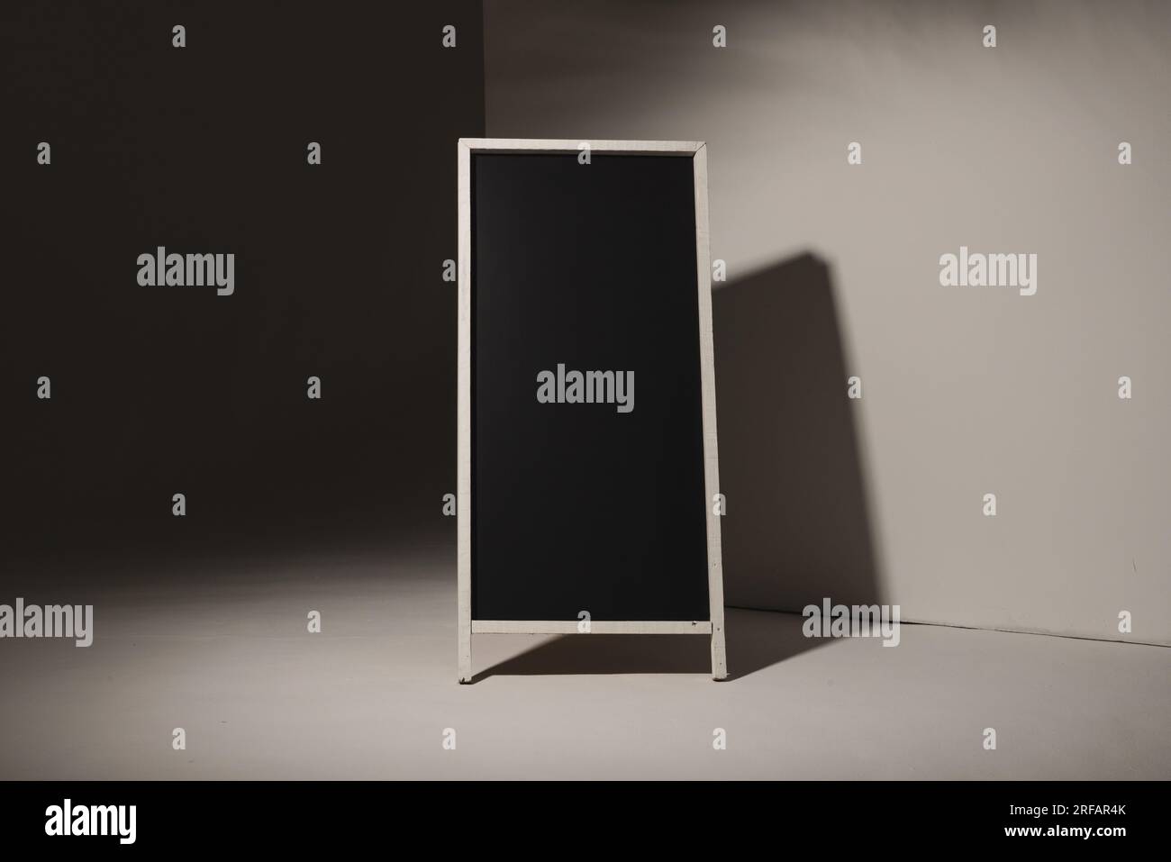 Black sign in white frame and copy space on grey background Stock Photo ...