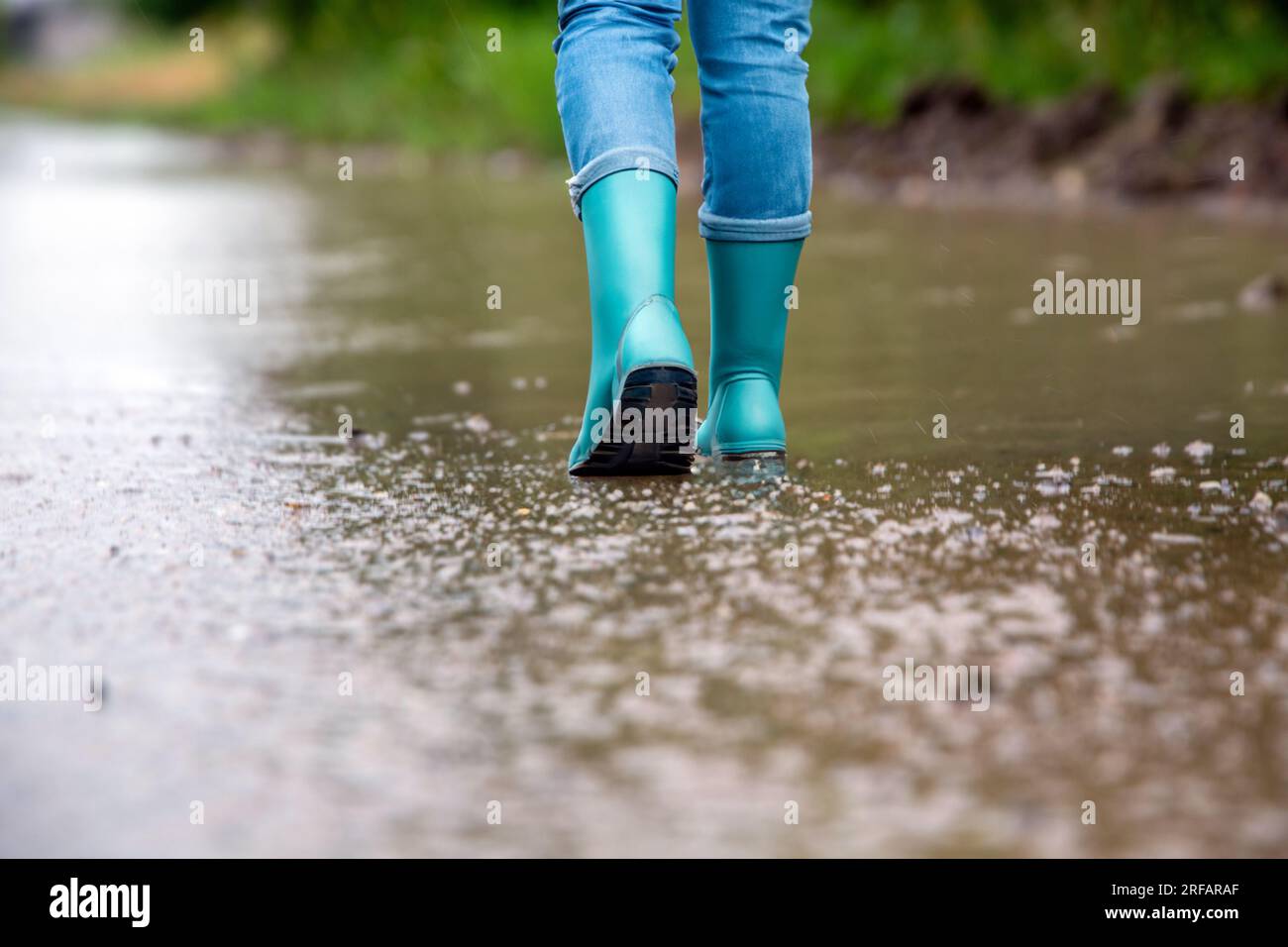 Woman on a walk in the rain (Symbol image, Composing Stock Photo - Alamy