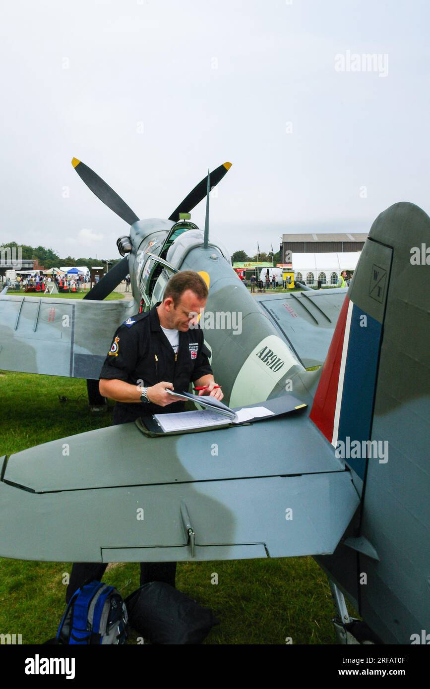 RAF Battle of Britain Memorial Flight crew filling out paperwork on the ...
