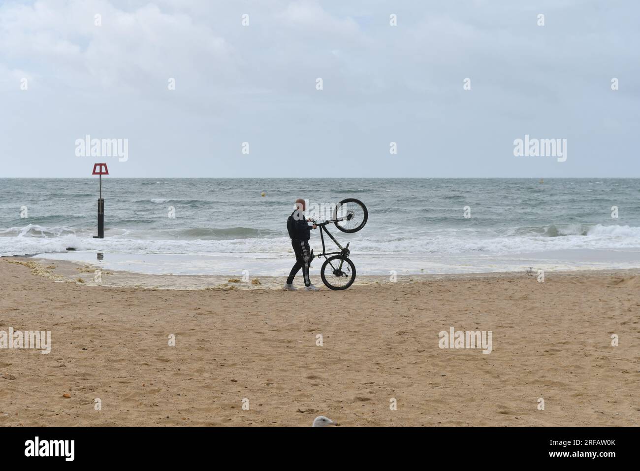Windy weather man walking hi-res stock photography and images - Alamy