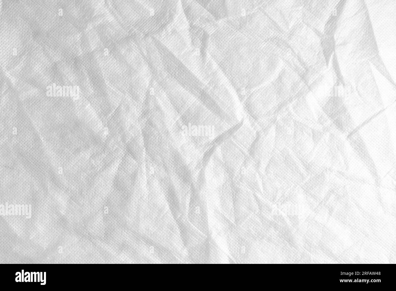 Wrinkled, crumpled white fabric texture background. Wrinkled and ...