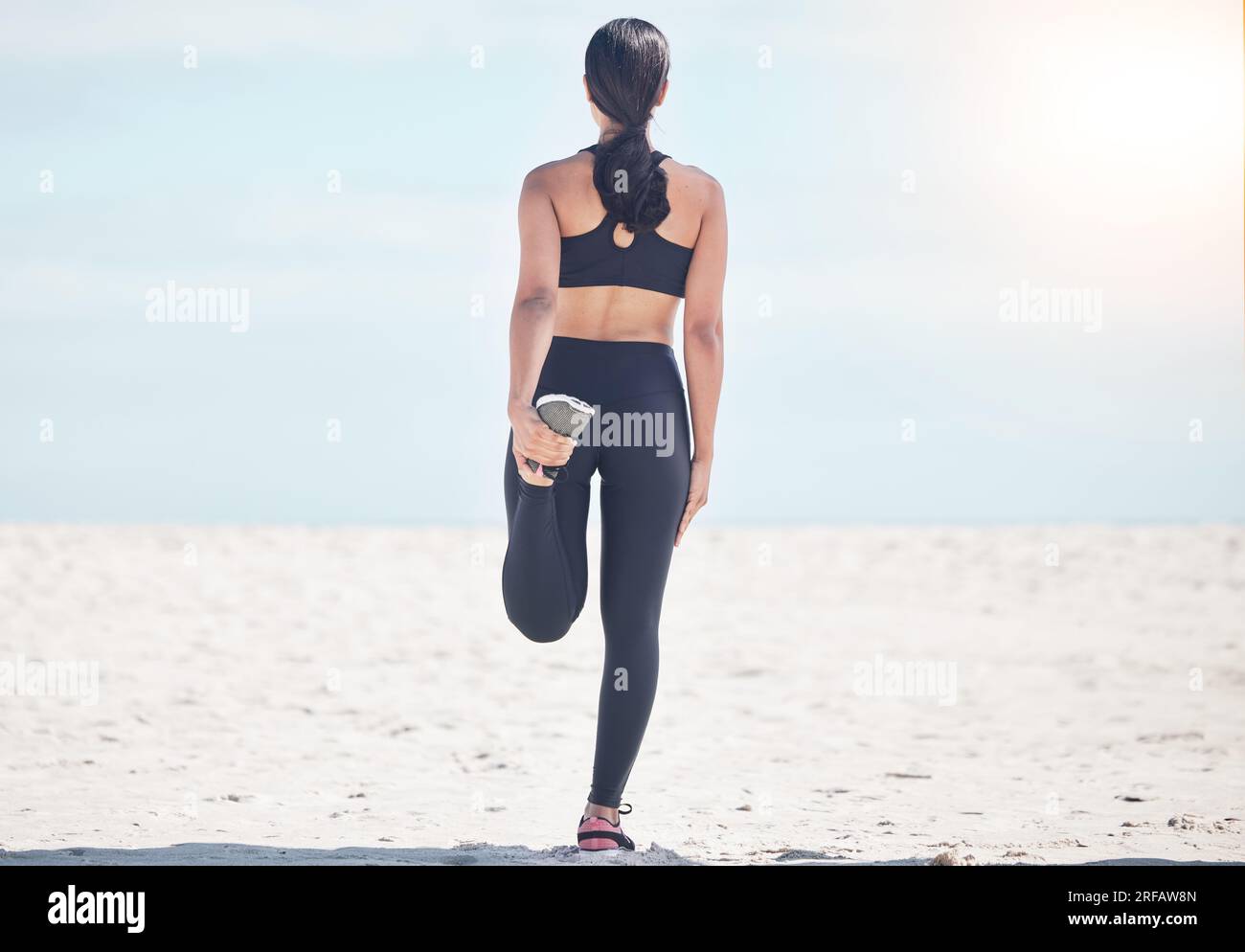 Woman exercise leg behind stretch hi-res stock photography and images ...