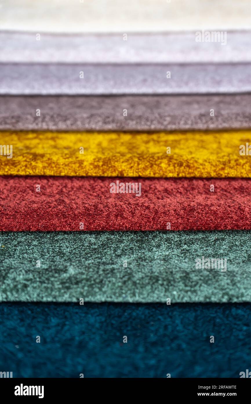 Bright collection of colorful textile samples. Fabric swatches, set in ...