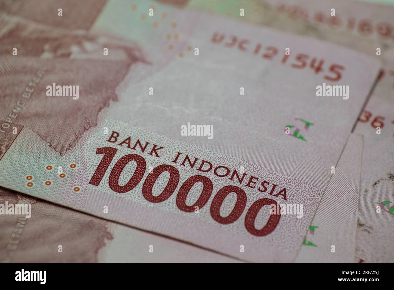 100,000 rupiah in the Indonesian rupiah currency as legal tender Stock ...