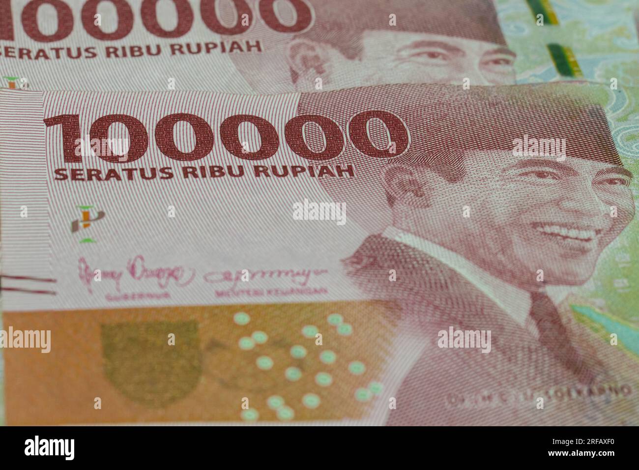 100,000 rupiah in the Indonesian rupiah currency as legal tender Stock ...