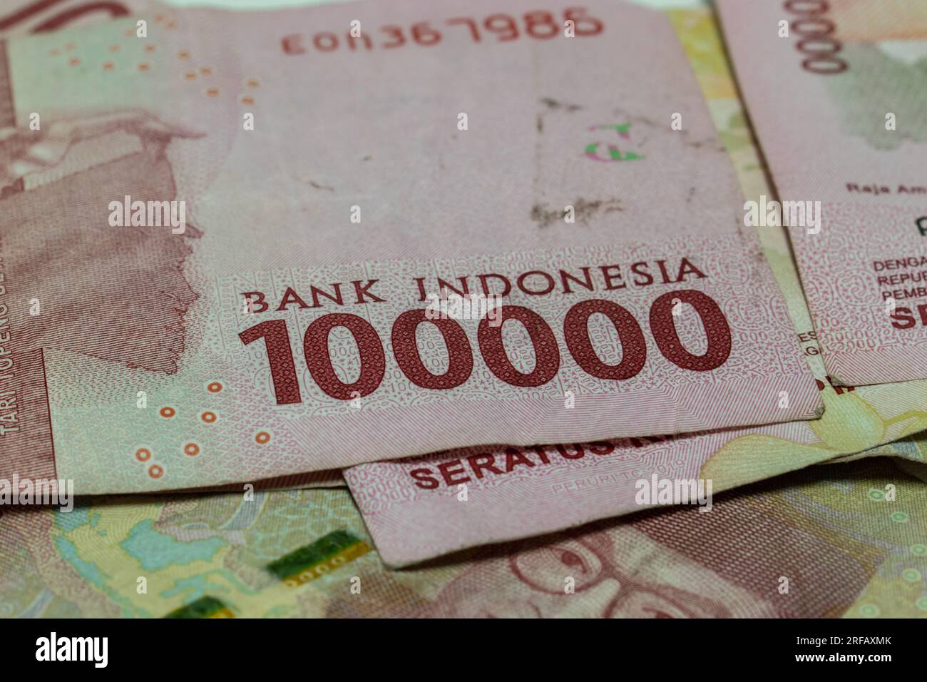 100,000 rupiah in the Indonesian rupiah currency as legal tender Stock ...