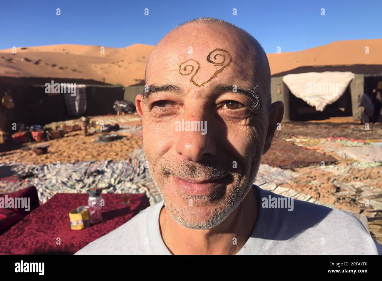 Portrait of a man in the desert Stock Photo - Alamy