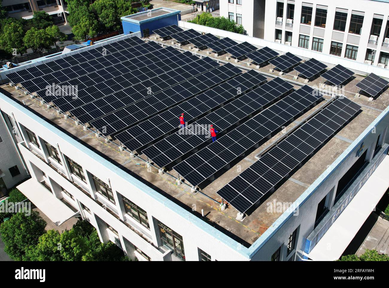 HANGZHOU, CHINA - AUGUST 2, 2023 - Employees of a power supply company ...