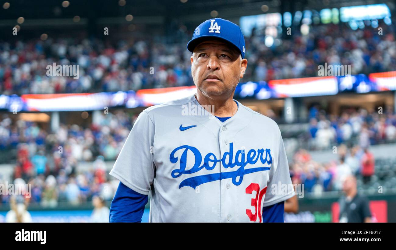 Los Angeles Dodgers manager Dave Roberts walks off the field before a ...