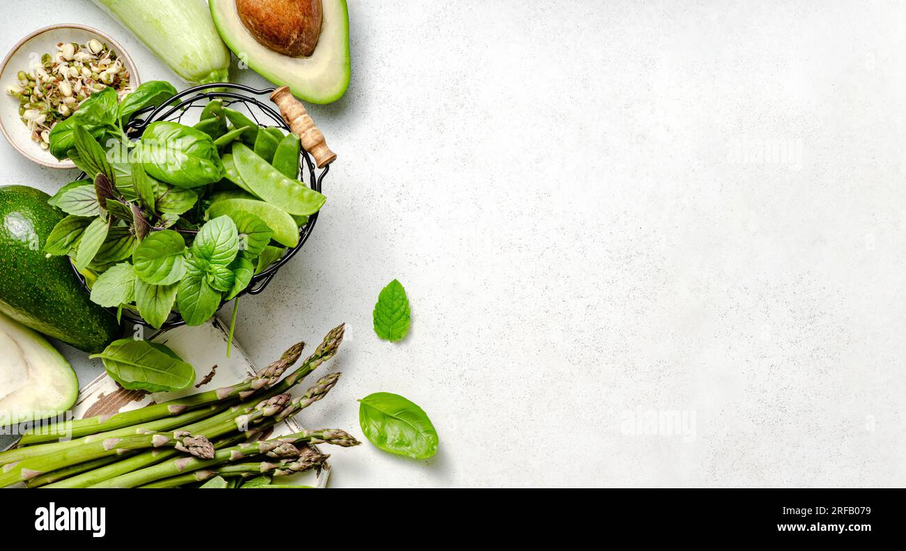 Vegetarian healthy green food on white background. Products for vegans ...