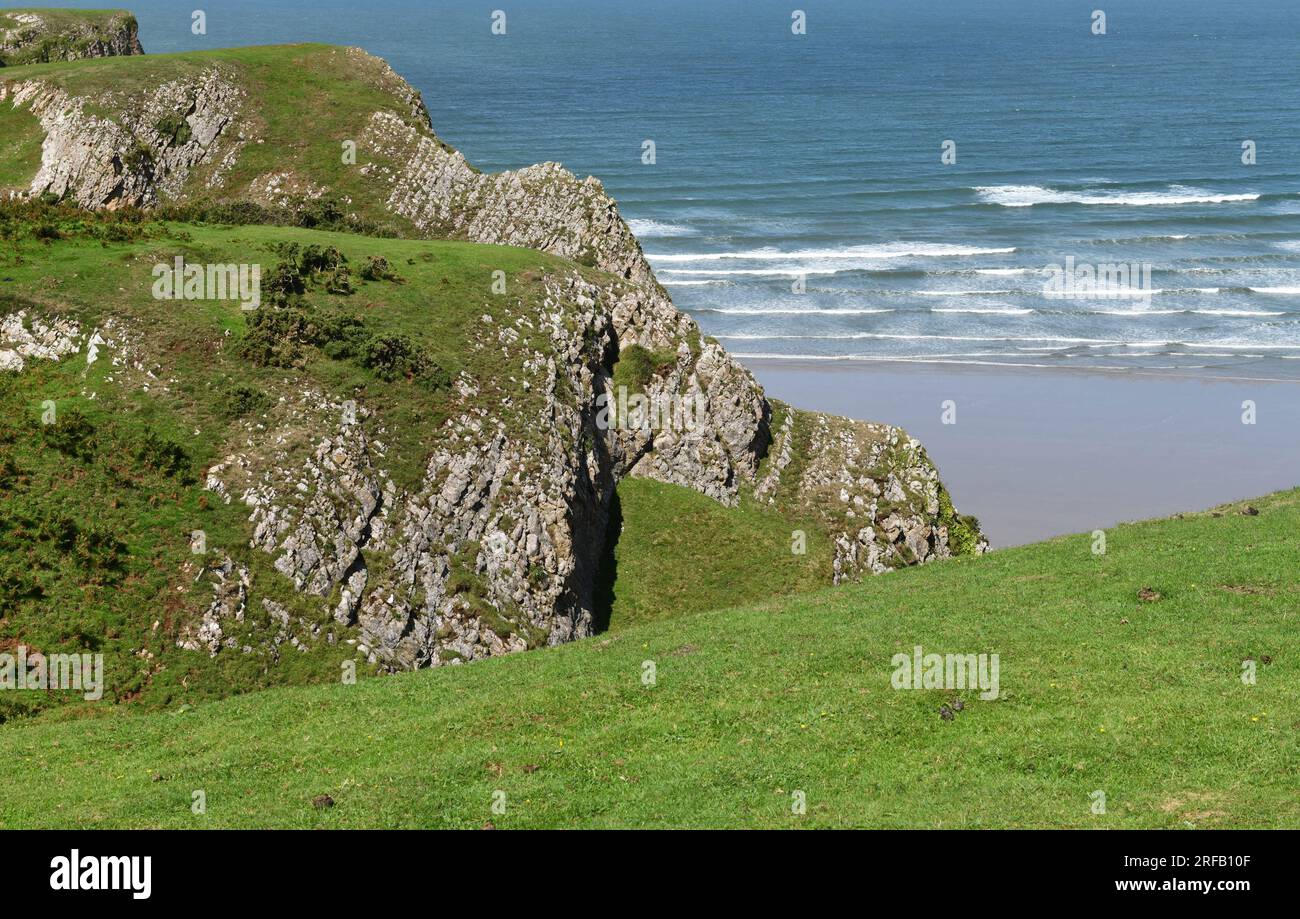 Limestone Cliffs overlooking Rhossili Beach just off the pathway that ...