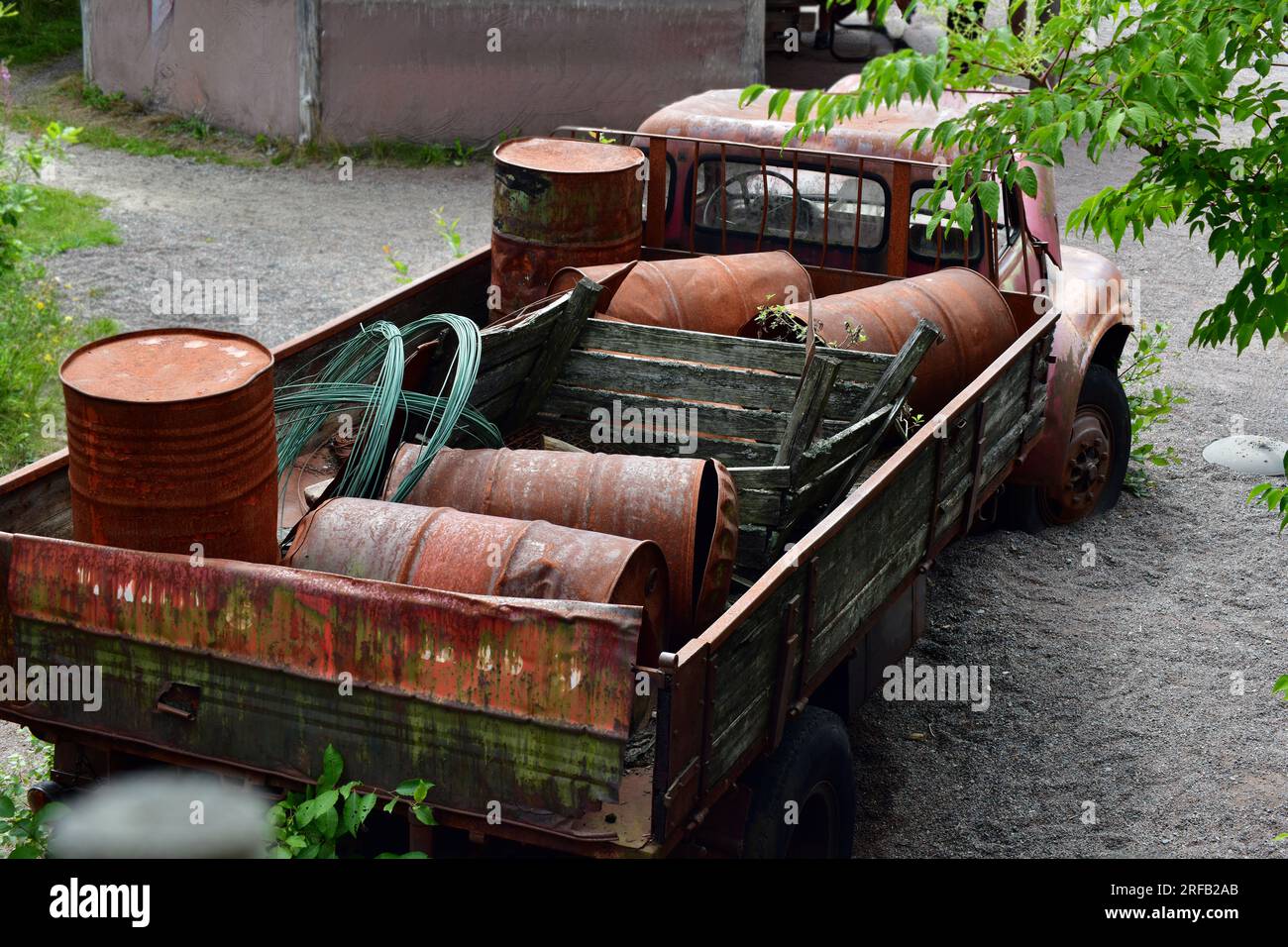 Rusty old truck with rusty petrol tanks Stock Photo - Alamy