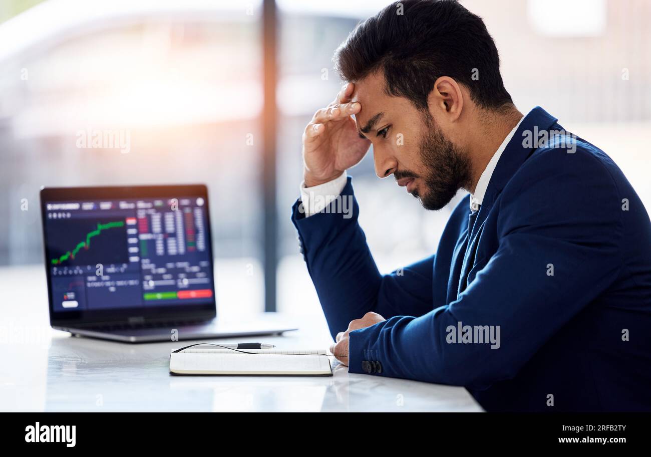 Trading, sad and laptop with man and stock market crash for finance ...