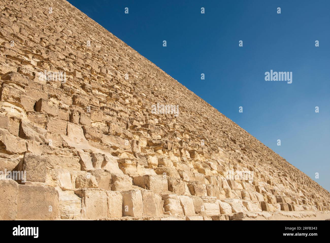 Abstract view of side sloping wall on ancient egyptian stone pyramid ...