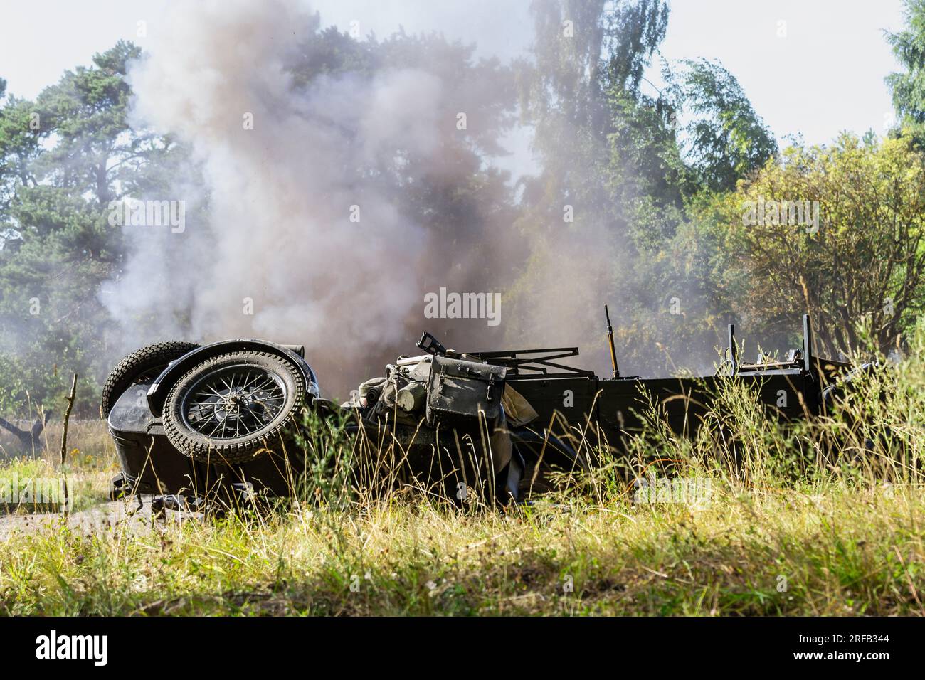 Historical reconstruction. An overturned and dirty German motorcycle ...