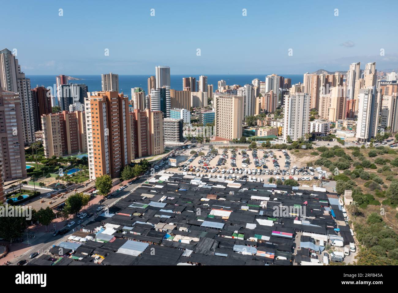 Aerial drone photo of the city of Benidorm in Spain in the summer time ...