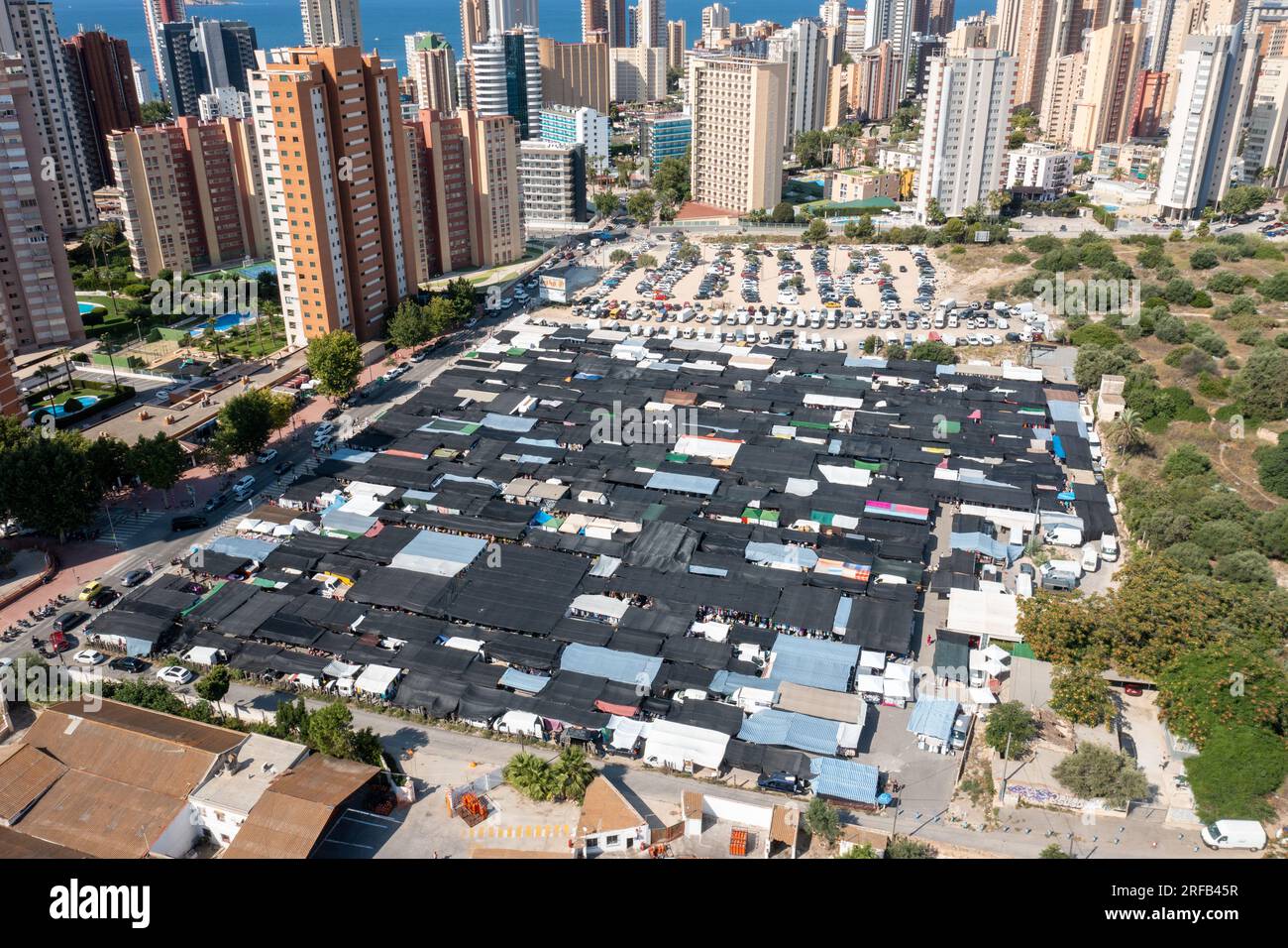 Aerial drone photo of the city of Benidorm in Spain in the summer time ...