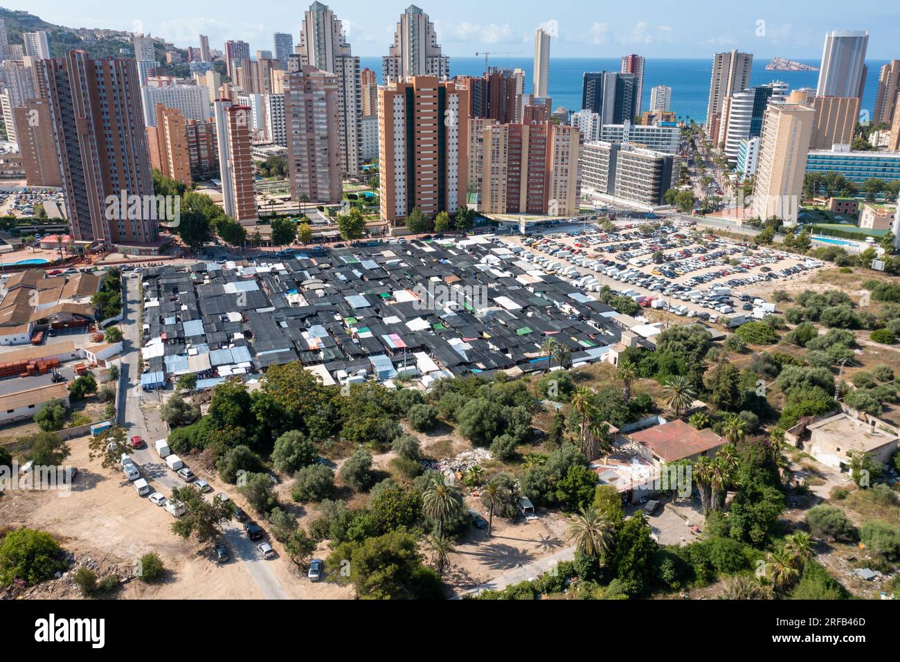 Aerial drone photo of the city of Benidorm in Spain in the summer time ...