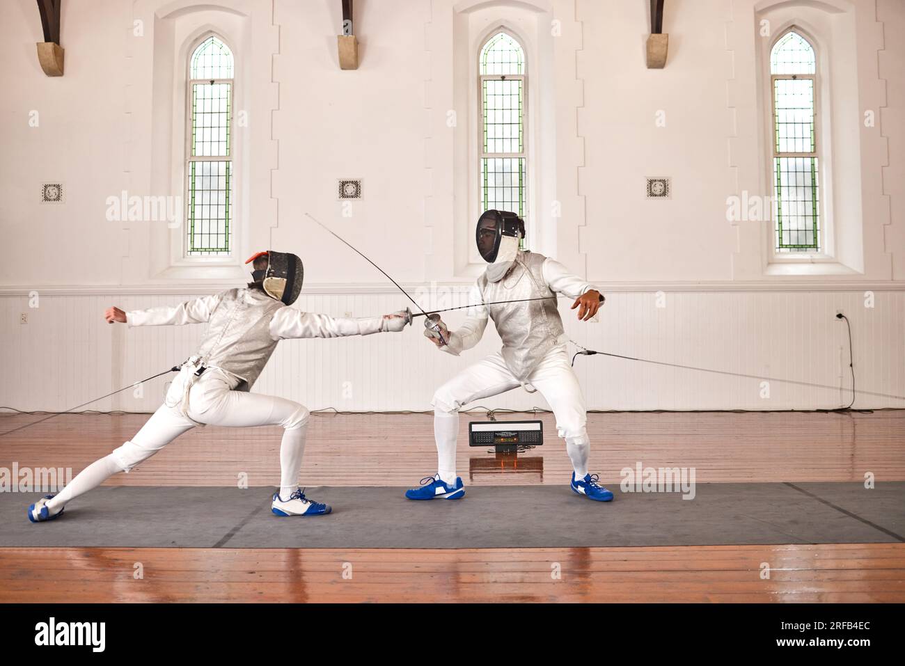 People, fighting and fencing with a sword in competition, duel or ...