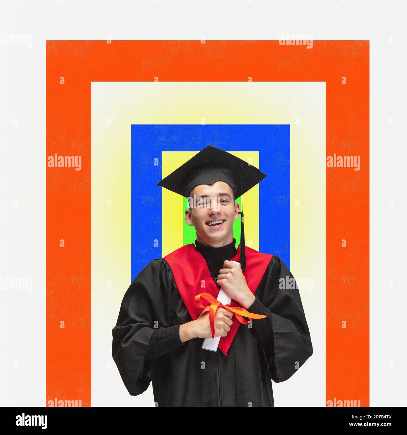 Portrait of young smiling boy in graduation gown with diploma in hands ...