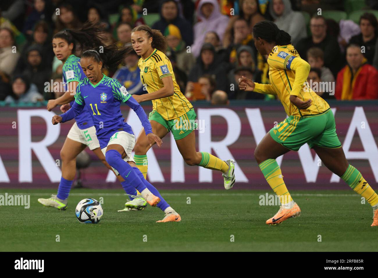 Brazil's Adriana, left, compete for controls the ball with Jamaica's ...