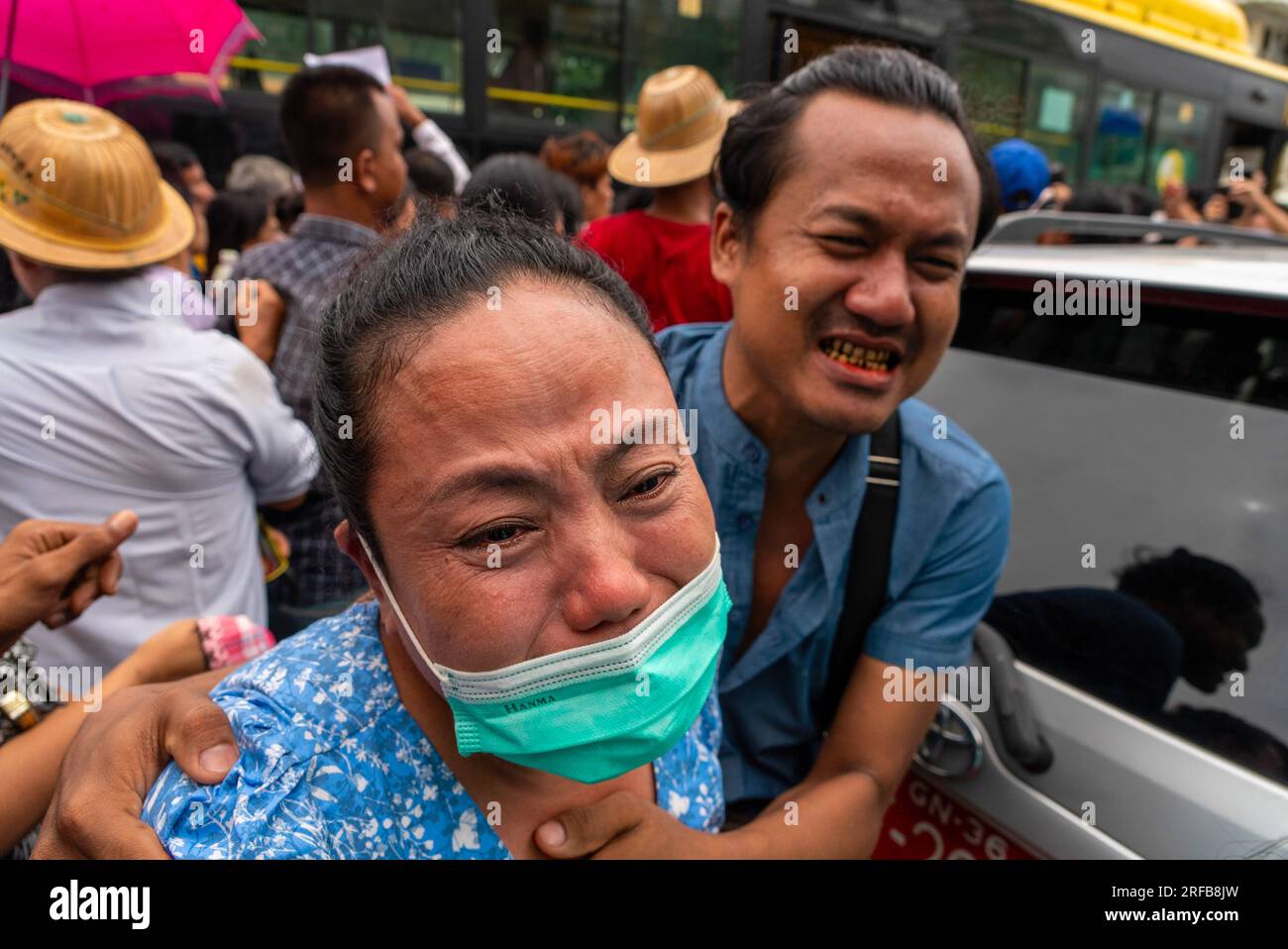 Yangon, Myanmar. 01st Aug, 2023. A woman cry with a relative upon her ...