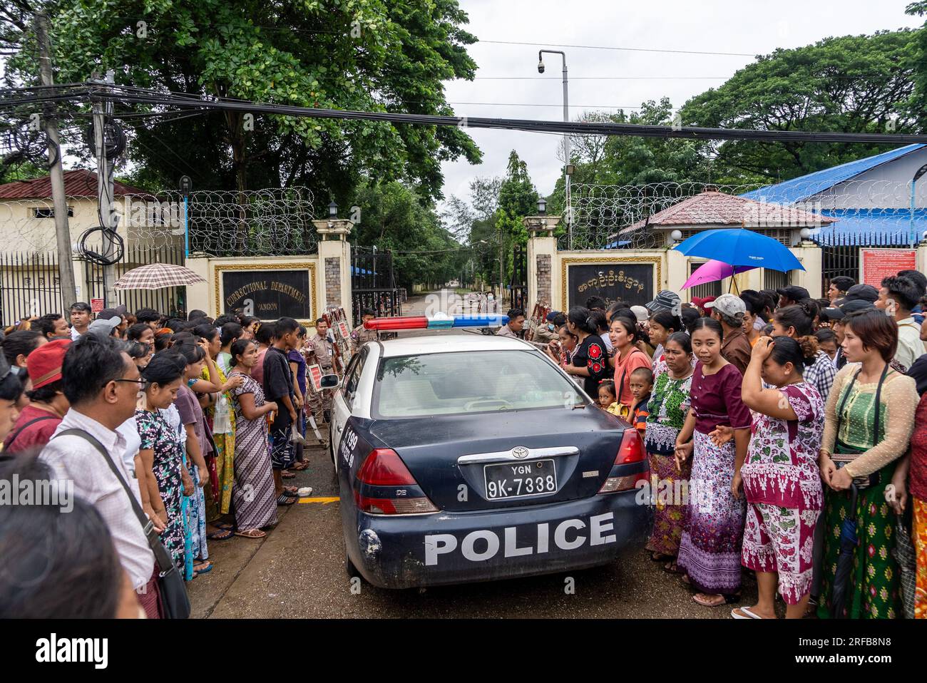 Yangon, Myanmar. 01st Aug, 2023. A police car enters the Insein ...