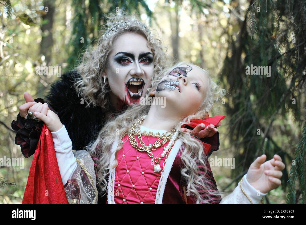 Female vampire bites woman hi-res stock photography and images - Alamy